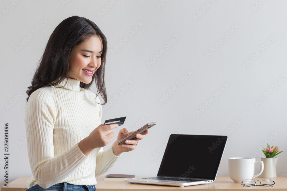 Young Asian women making mobile banking, purchasing online shop. Stock ...