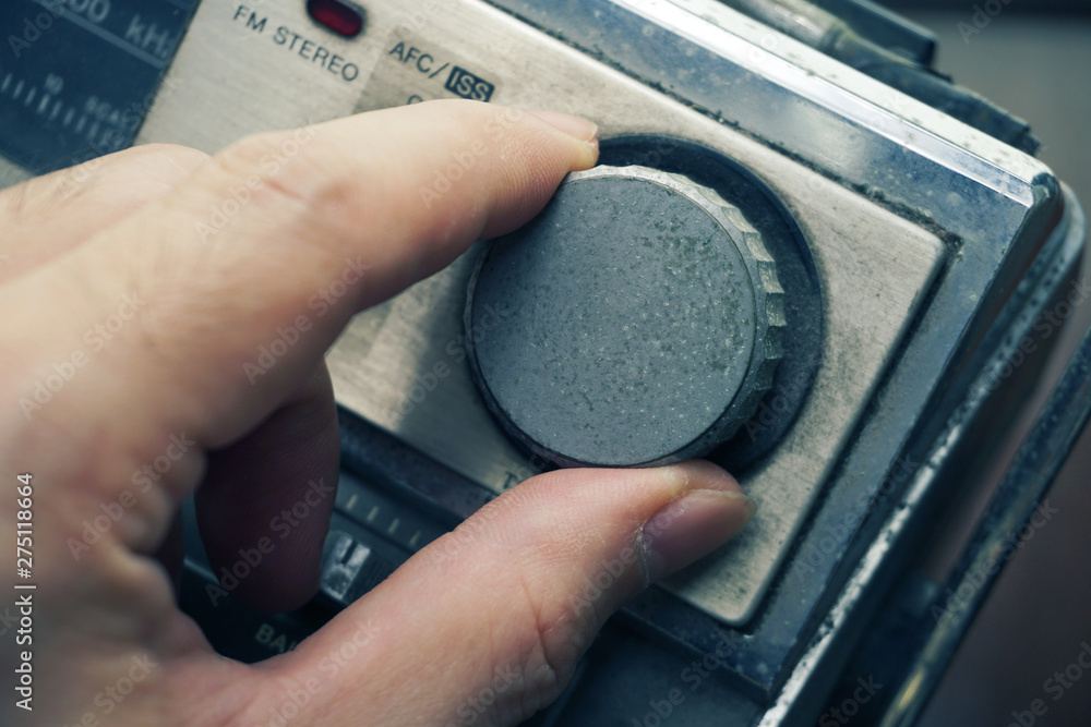 Hand adjust signal tuning of vintage cassette tape dial. Stock Photo ...