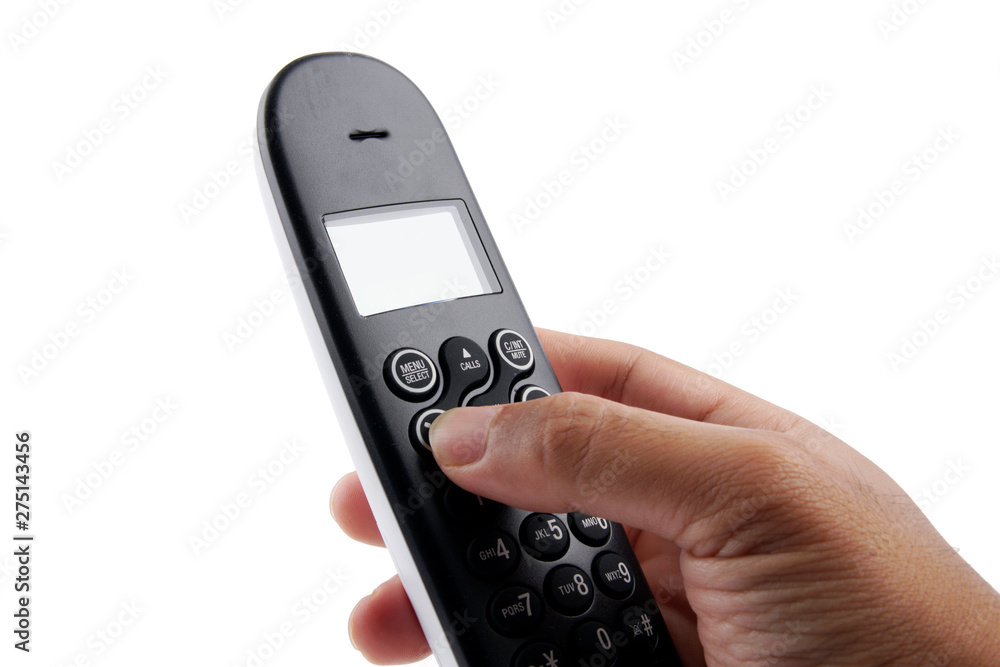 Hand holding home or office telephone with line on white background ...