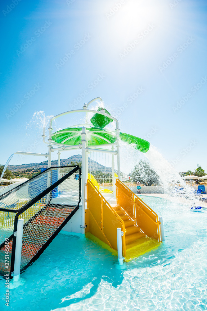 Children's water playgrounds and flip-flops with flowing, falling and ...