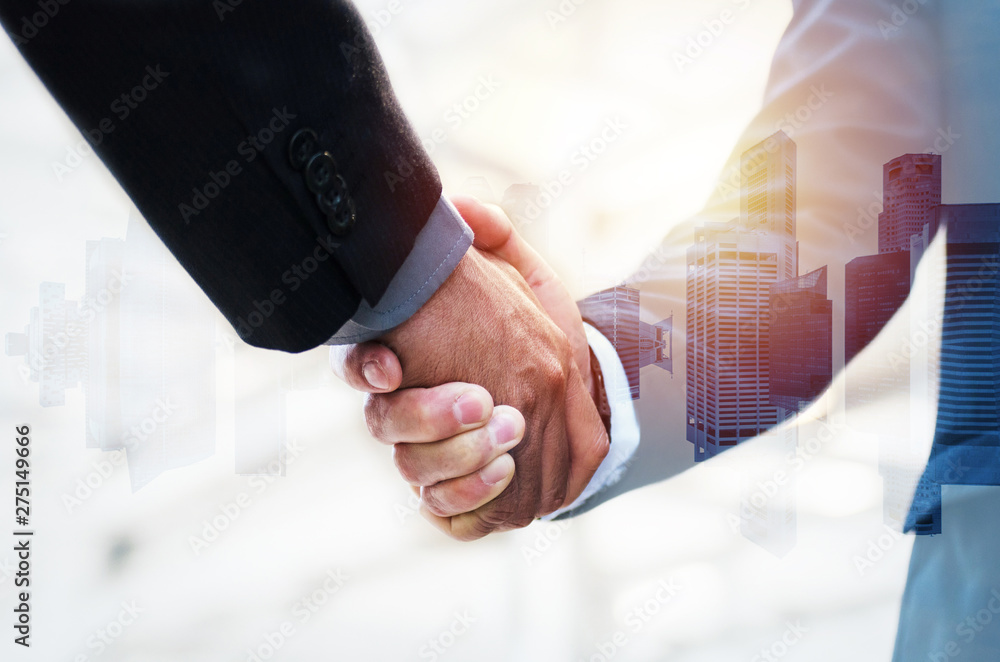 Partnership. double exposure image of investor business man handshake ...