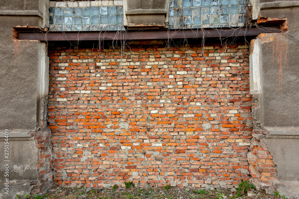 Bricked up door or gate frame. Condemned neglected deserted industrial ...