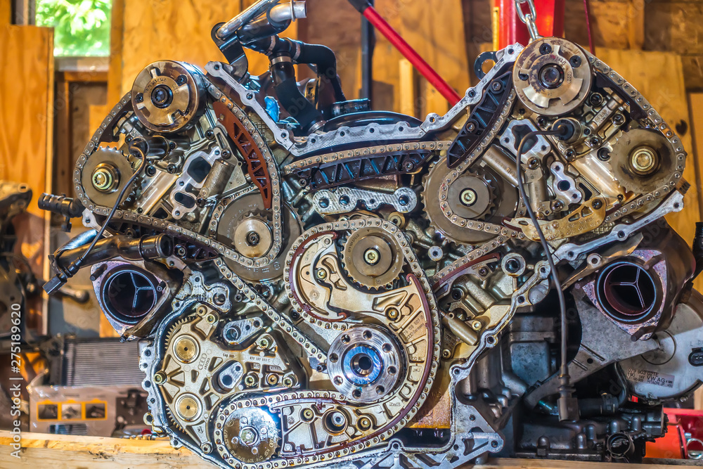 v8 engine from car being rebuilt in garage Stock Photo | Adobe Stock
