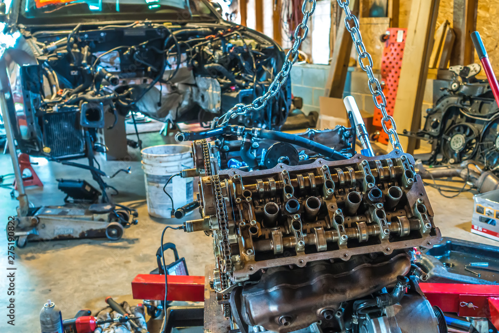 v8 engine from car being rebuilt in garage Stock Photo | Adobe Stock
