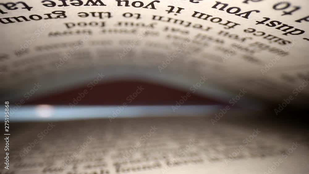 Slowly pulling lens out of a book @ words eye diagonal view of the ...