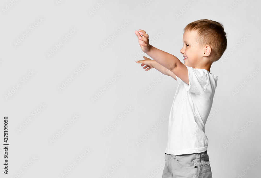 Little boy kid shows hugs with open arms Stock Photo | Adobe Stock