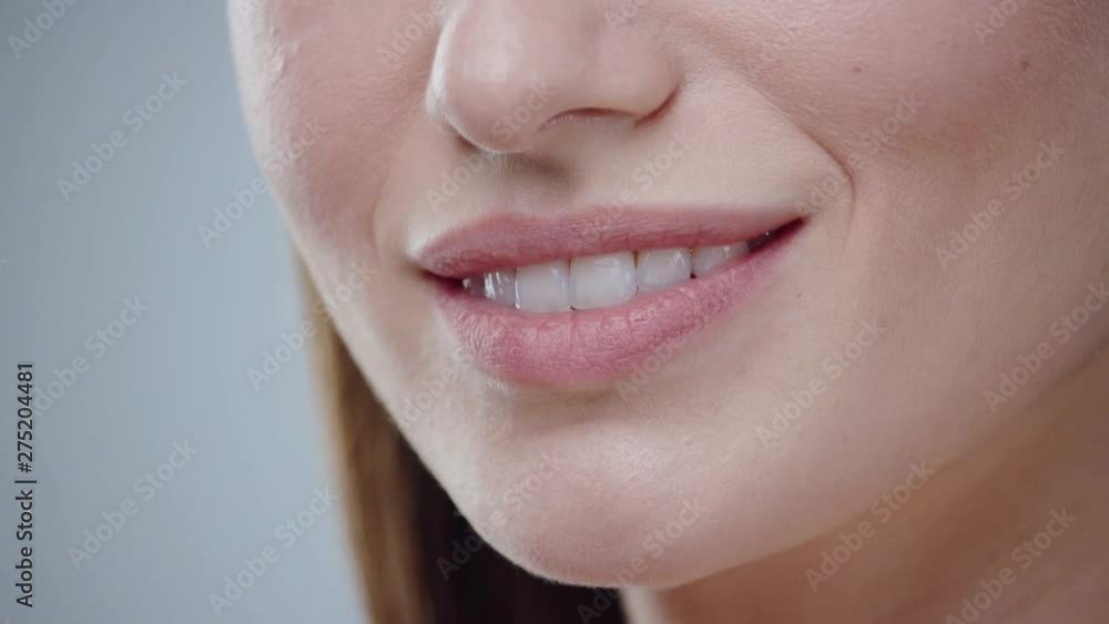 Close up young woman mouth smiling happy beautiful soft lips showing ...