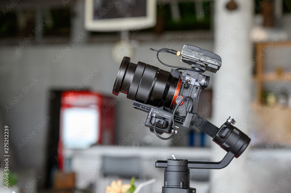 Mirrorless camera with mic wireless on gimbal stabilizer Stock Photo ...