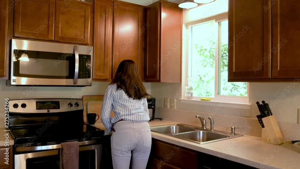 Video Stock Young asian woman walk in wood vintage style kitchen ...