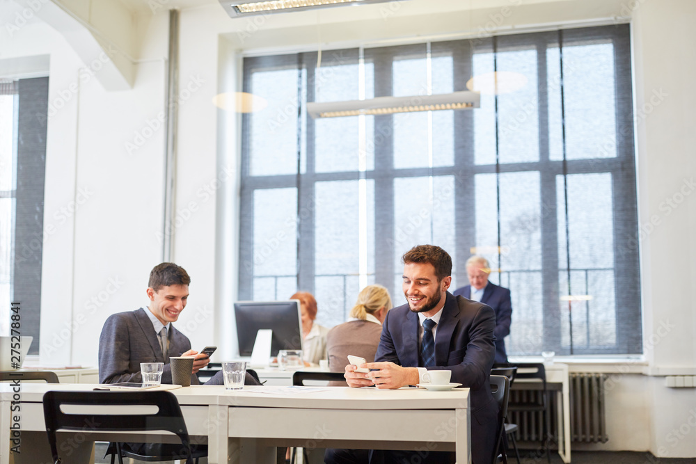 Business people coworking in office sharing Stock Photo | Adobe Stock