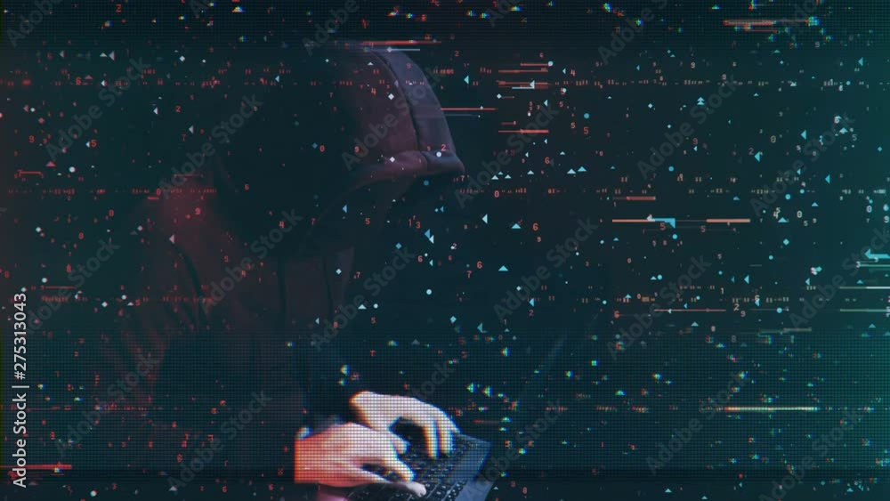 Cyber crime attacks. Man hacker in a black mask, black sweatshirt and ...