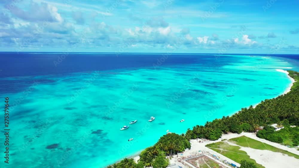 Aerial drone footage of the beach of a resort island in the Bahamas ...