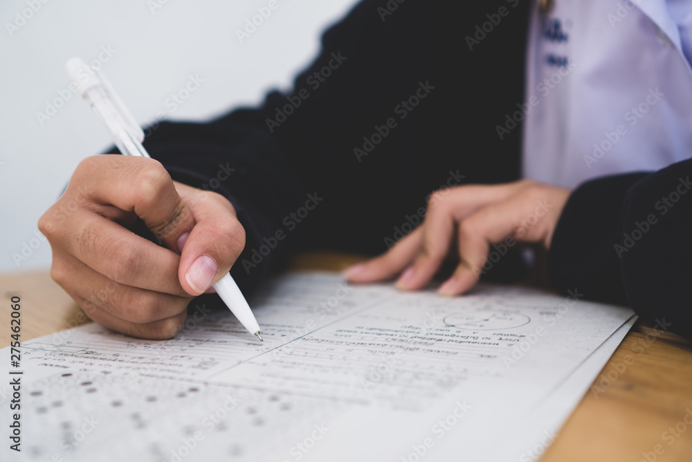Education test exam concept, high school / university student holding ...