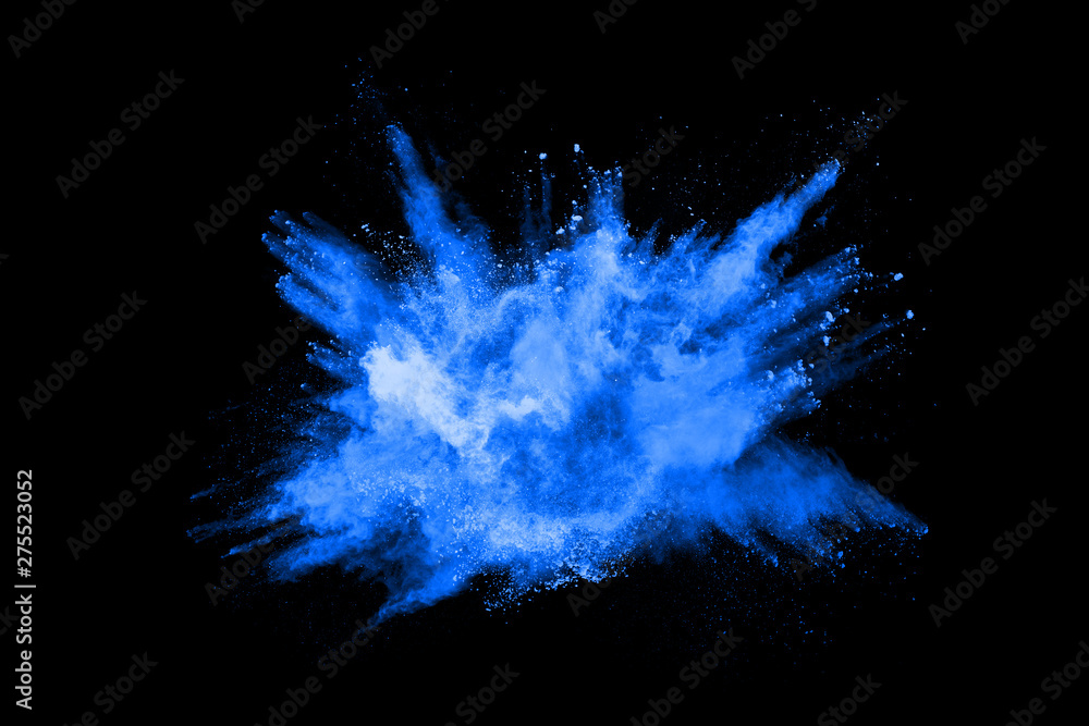 abstract blue powder splatted background,Freeze motion of color powder ...