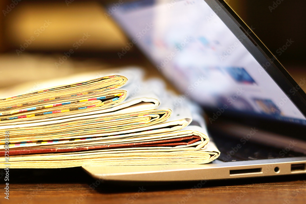 Newspapers and Laptop. Different Concepts for News - Network or ...