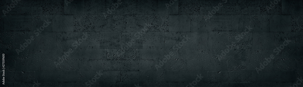 Black tuff brick wall wide texture. Dark rough stone block masonry ...