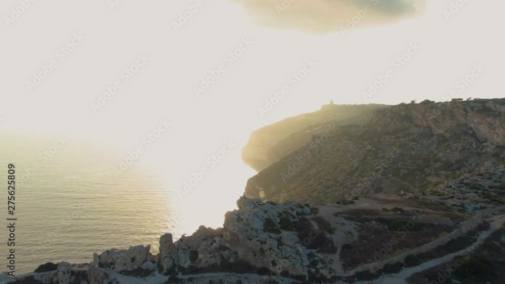 Dingli Cliffs in the sunset with dramatic sky, aerial drone dolly in ... Dingli Cliffs in the sunset with dramatic sky, aerial drone dolly in ...