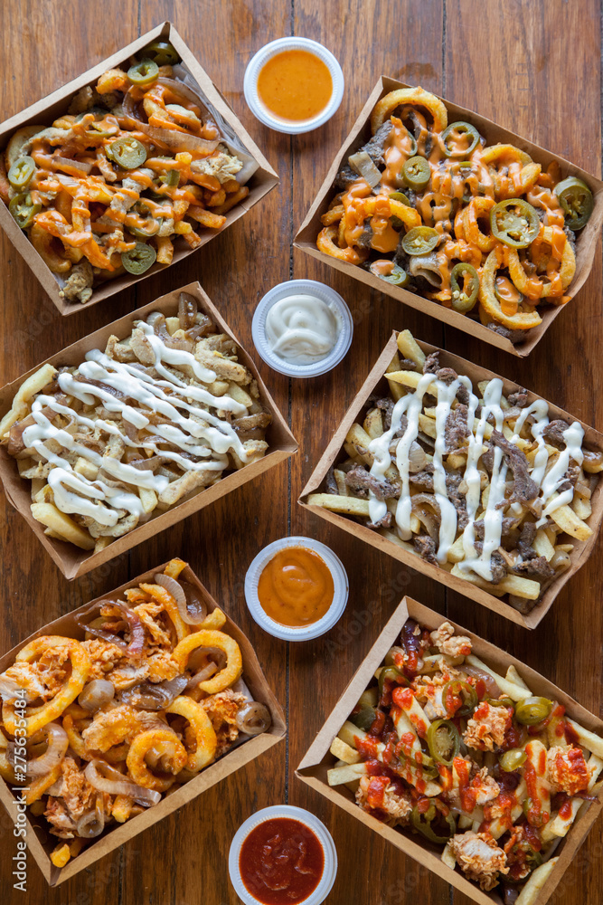 French fries poutine different flavours with dip sauces Stock Photo ...