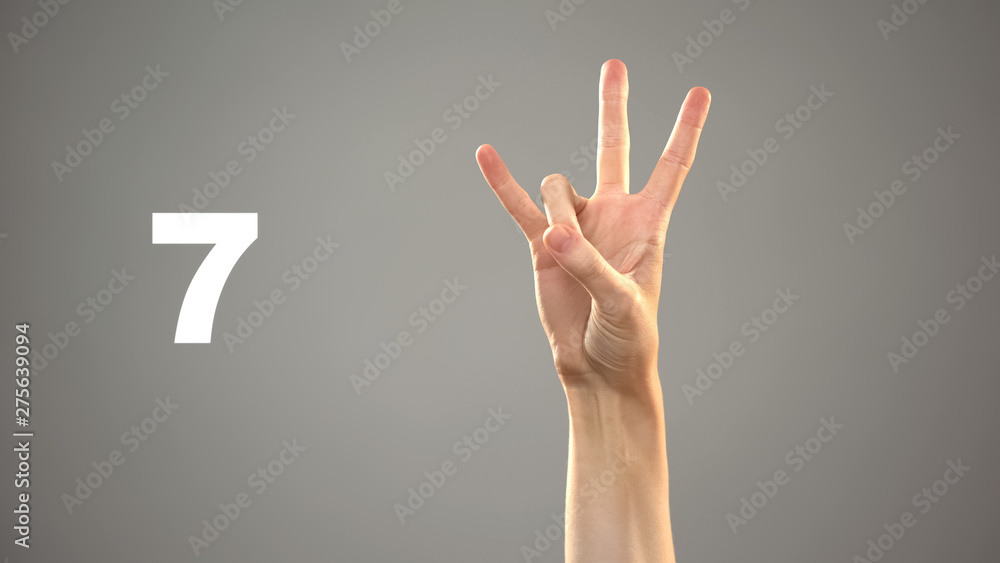 Hand signing 7 in asl, number on background, sign language tutorial for ...