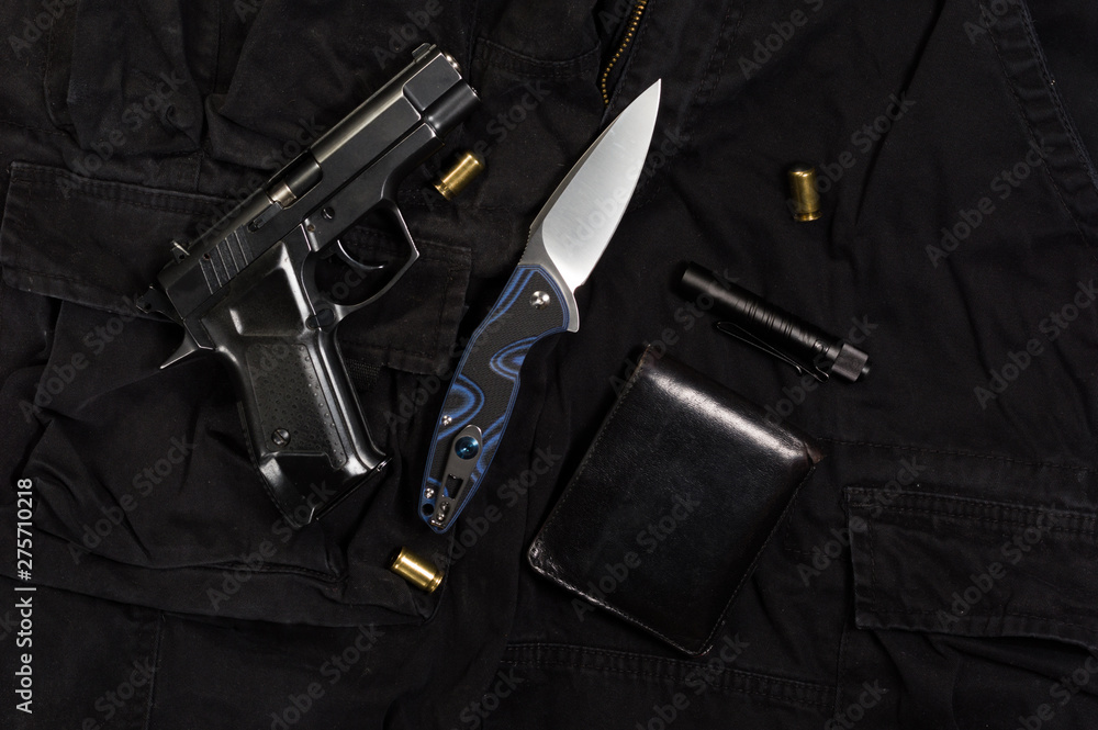 Traumatic pistol and cartridges. Weapons for self-defense. Stock Photo ...