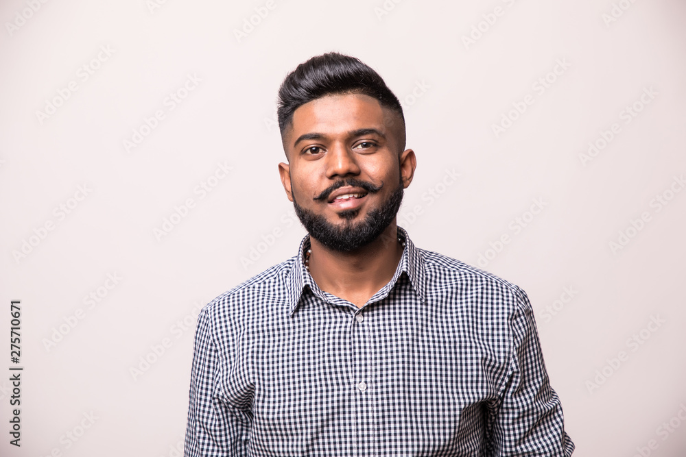 Young indian man standing isolated on white background Stock Photo ...