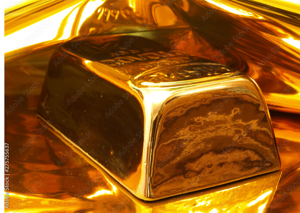 Bank gold bar on a gold background Stock Photo | Adobe Stock
