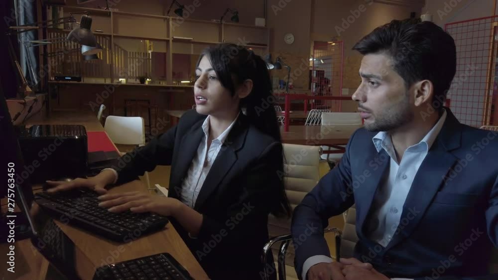 Attractive female business colleague in formal wear office comes up ...