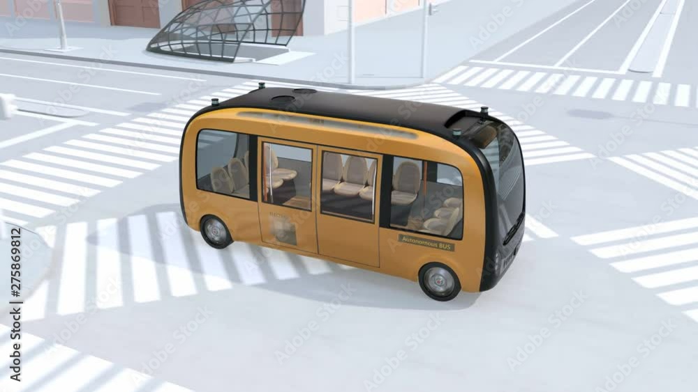 Self-driving shuttle bus driving through an intersection close to bus ...