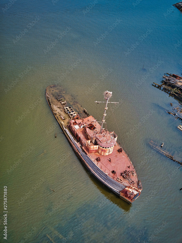 Aerial drone image of Sunken and rotting Wood ships and rotting hulls ...