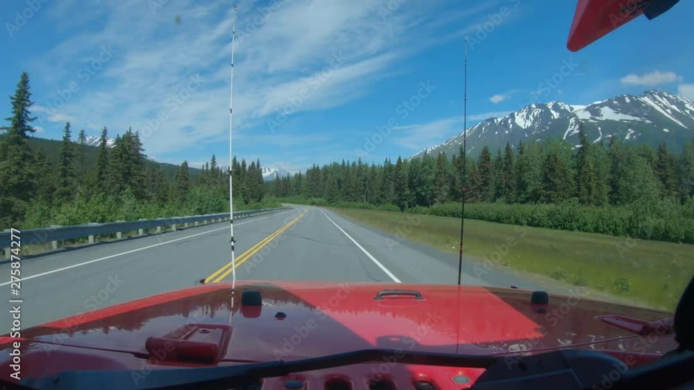 POV - Driving in Kenai Peninsula of Alaska Seward Highway in red off ...