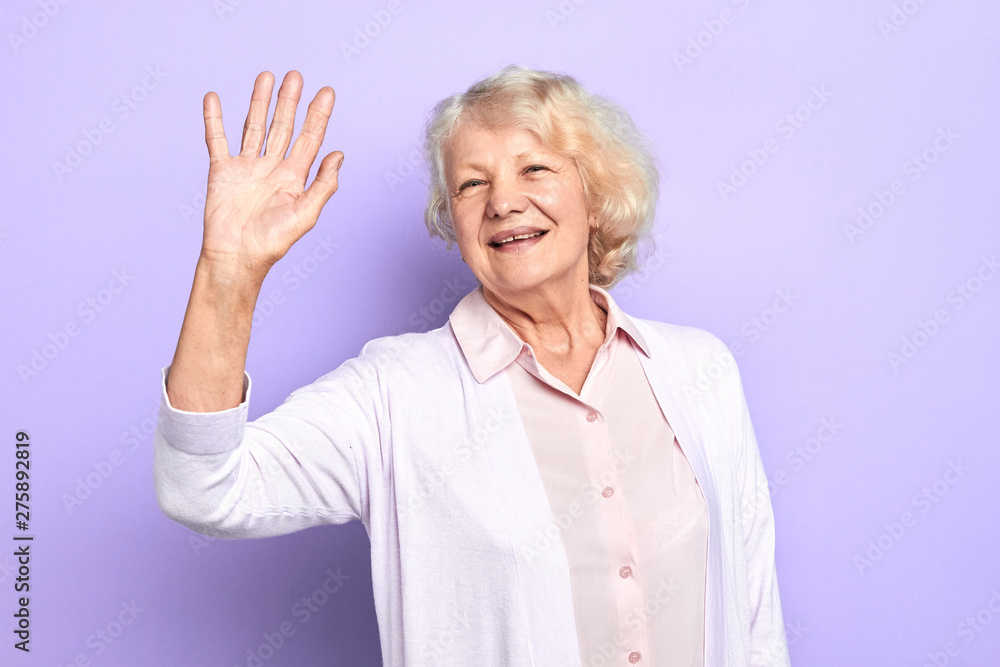 Hello Happy stylish old woman with a smile on her face fallen hand in ...