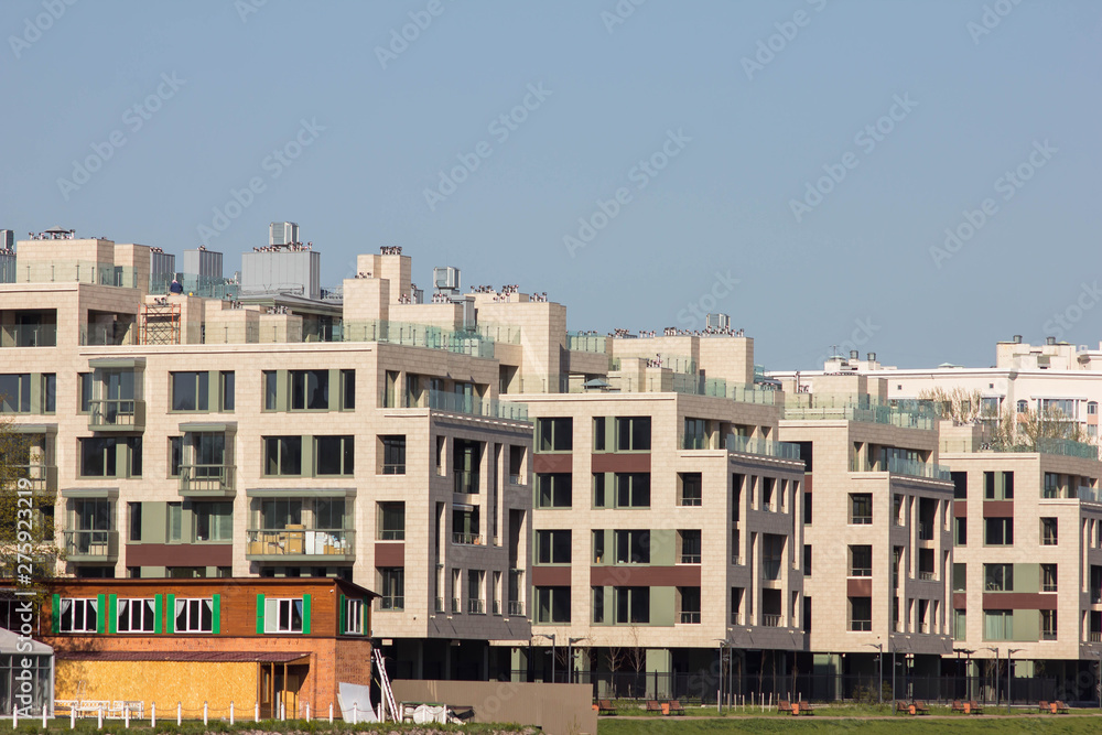 Residential area mid-rise buildings. Houses at the embankment of the ...