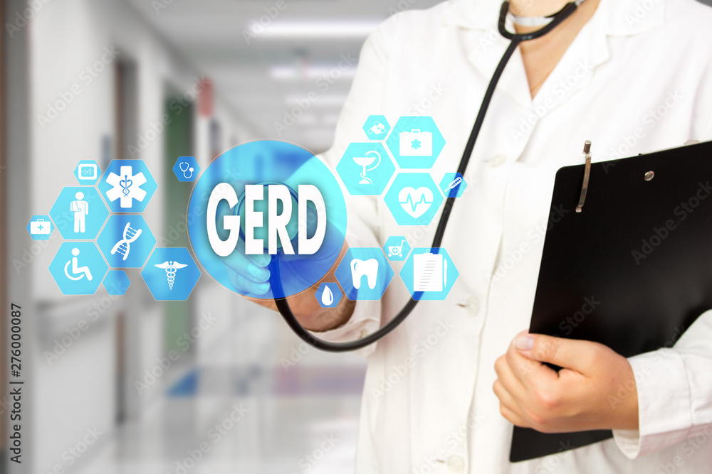 Medical Doctor with stethoscope and word GERD, Gastroesophageal reflux ...