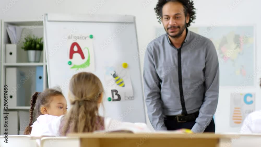 Handheld medium shot with rack focus of unrecognizable little girl ...