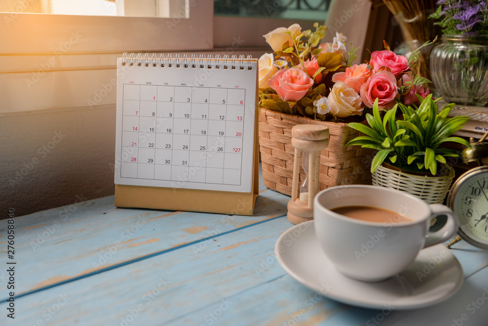 Desktop Calendar 2019,vintage clock and cup of coffee place on wooden ...