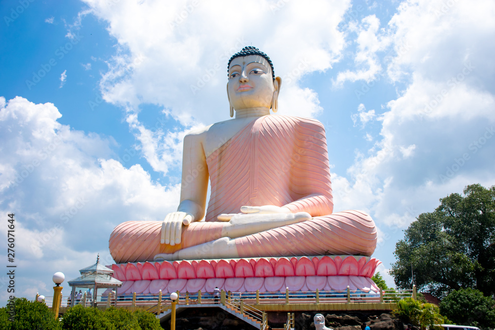 Buddha statue at the Kande Vihara Temple with Cloudy Blue Sky, Bentota ...