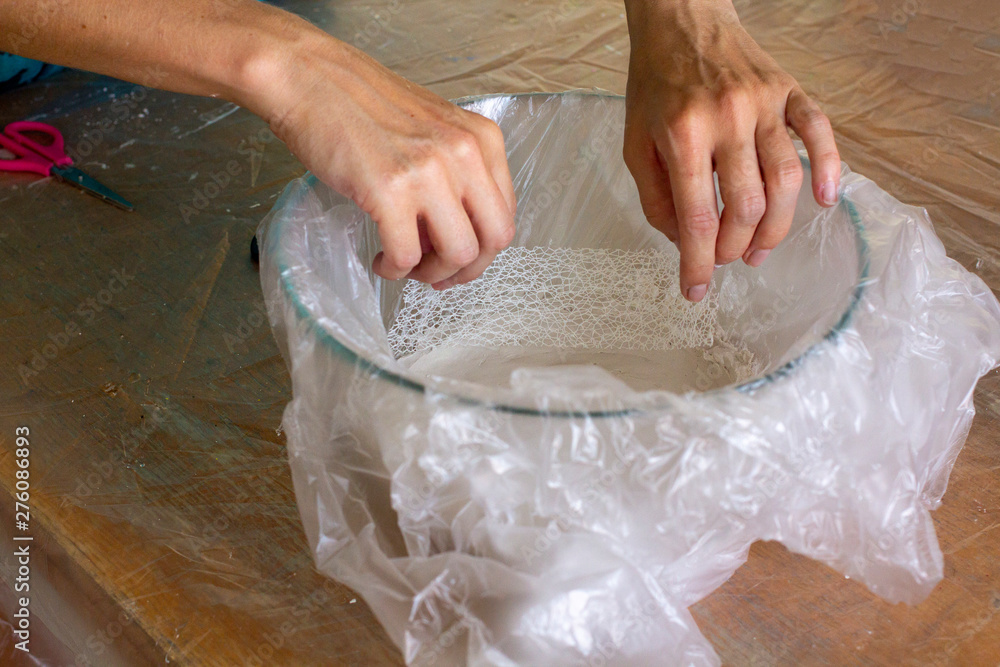 Making a homemade dish for the fruit of the plaster. Shaping wet ...