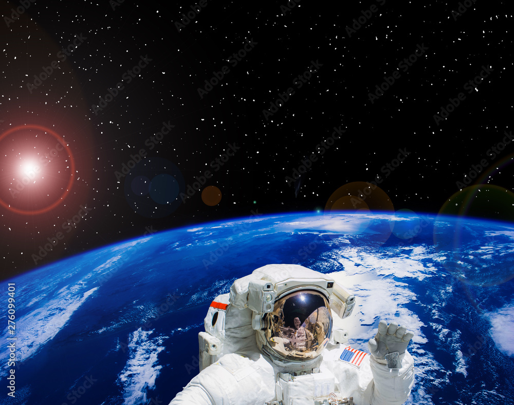 Astronaut and earth on the backdrop. The elements of this image ...