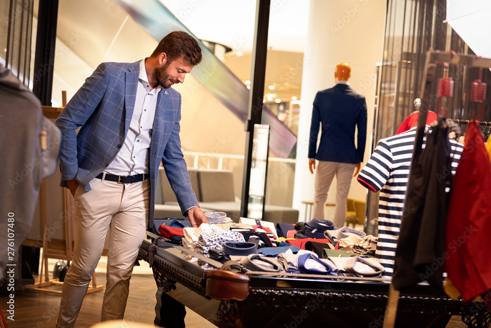 Young modern man envying in shopping Stock Photo | Adobe Stock