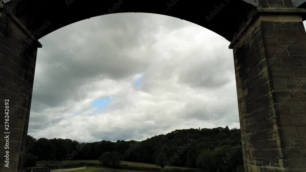 Pontcysyllte Aqueduct arch bridge canal waterway crossing. Aerial tilt ...
