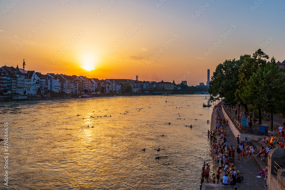 Top view from Middle Bridge of people relax and chill out on riverside ...