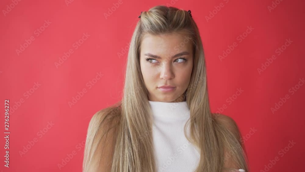 Angry woman face expression. Resentful. Close up of upset model face ...