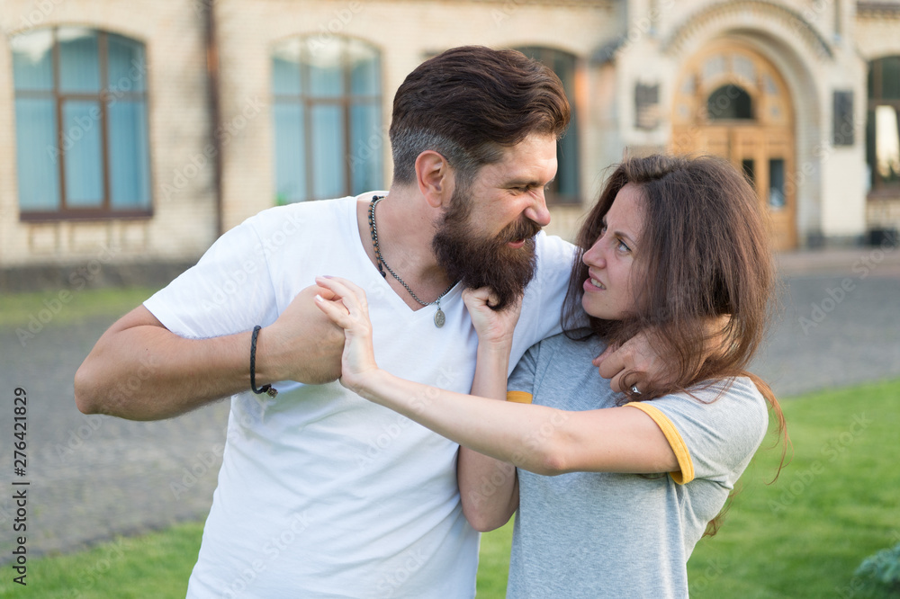 Stop it. Brutal hipster fighting with pretty woman. Violence concept ...