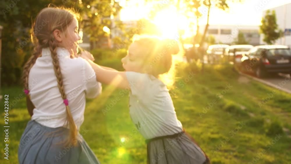 Two girlfriends are fighting. School friendship, teen girls fight for ...