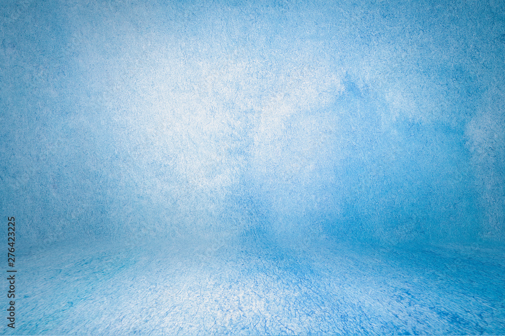 blue photo backdrop wall and floor lit by lamps, studio background for ...