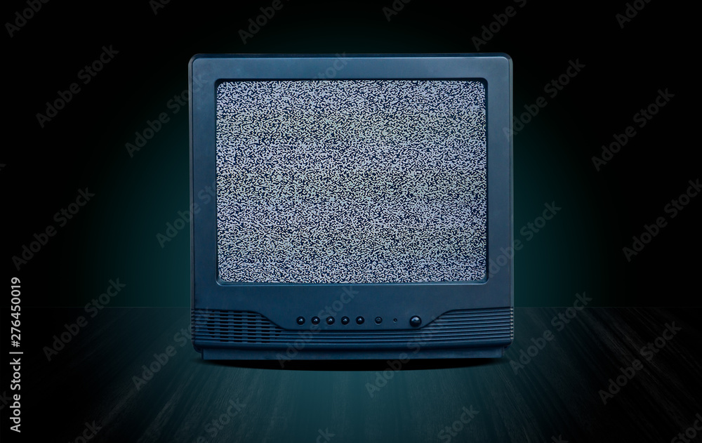 vintage old television receiver on table front gradient green wall ...