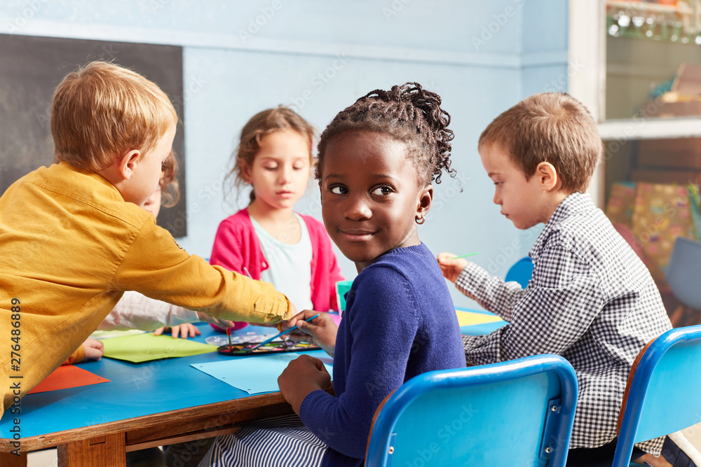 Group of kids together in the painting class Stock Photo | Adobe Stock