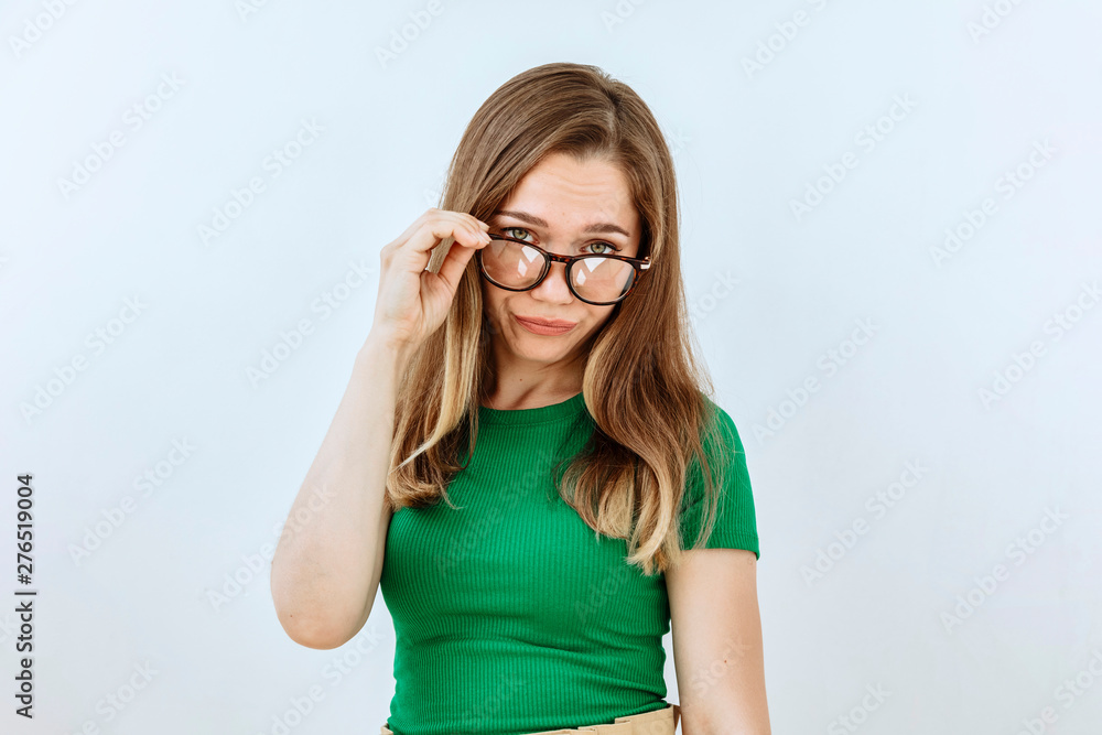 Skeptic and mistrust emotion. Young girl in eyeglasses portrait against ...