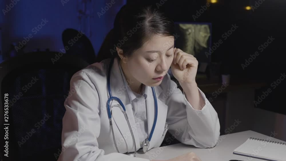 Sleeping doctor woman in clinic office tired of work load at night ...