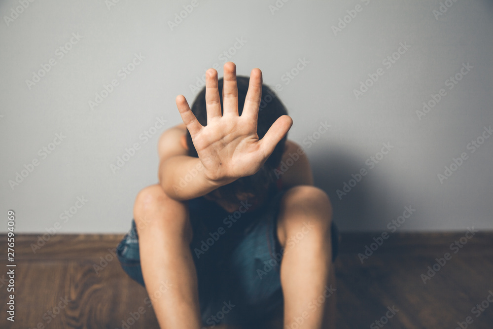 sad boy hand stop sign in home Stock Photo | Adobe Stock